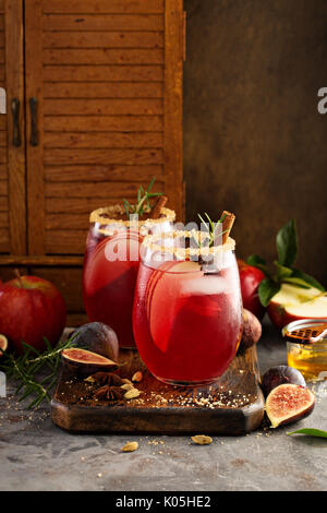 Fall sangria cocktail, fig and honey martini with thyme Stock Photo - Alamy