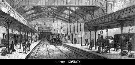 Platform at Aldgate Underground Station, London showing station name in ...
