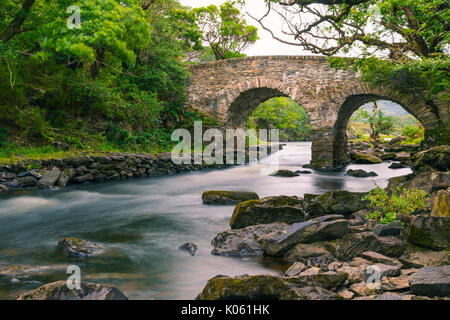 The Old Weir Bridge is an ancient bridge located in Killarney National ...