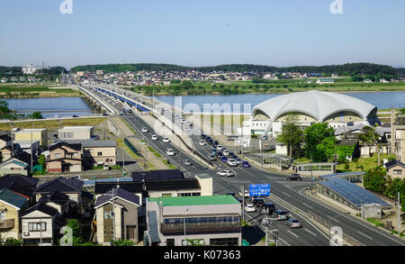 Sakata, Japan - May 19, 2017. Aerial view of Sakata City with mountains ...