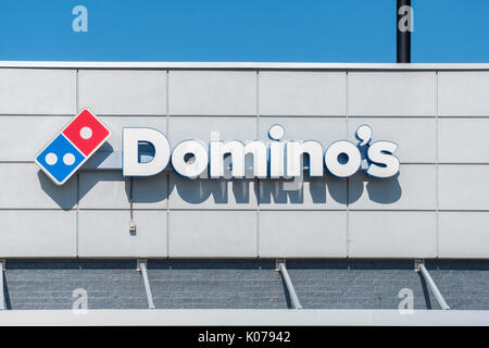 Exterior storefront of Domino"s Pizza serving pizza pie in Norman ...
