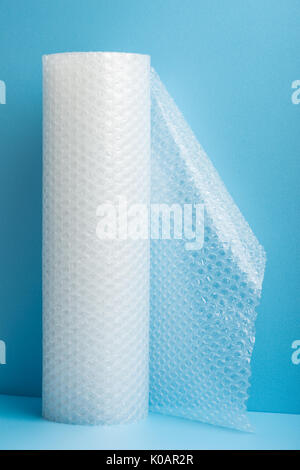 Blue bubble wrap plastic material - packing supplies for diverse ...