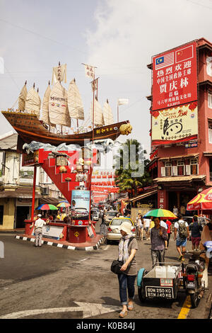 Melaka, Malaysia - Feb 9, 2014. People waiting at the local restaurant ...