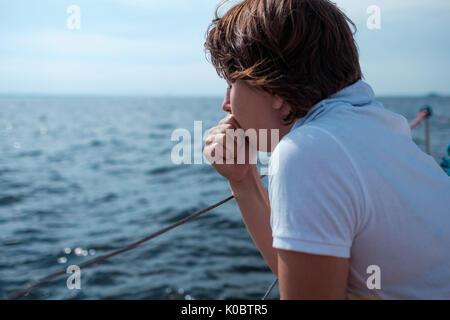 Young woman suffer from seasickness during vacation on boat. Cruise sea ...