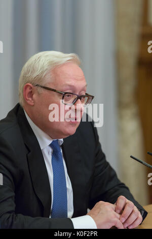 Russian Deputy Foreign Minister Sergei Ryabkov speaks to the media ...