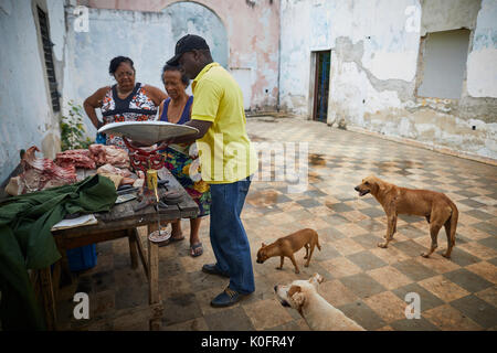 Cuban, Cuba, Cardenas, local butcher selling meat from a run down shop ...