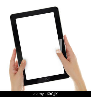 Hands holding tablet computer with business charts on screen against ...