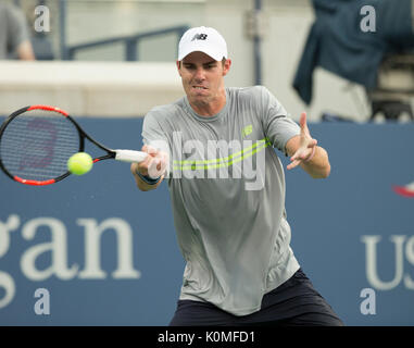 Reilly Opelka, of the United States, returns a shot to Carlos Alcaraz ...