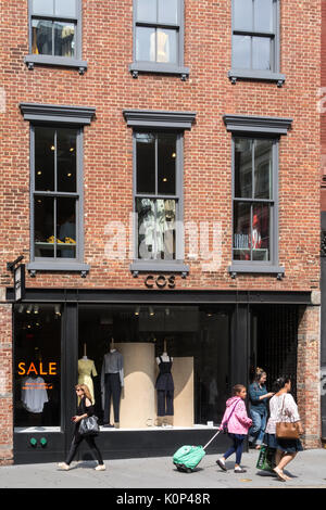 Cos shop boutique in city shopping gallery. Signboard logo brand sign ...