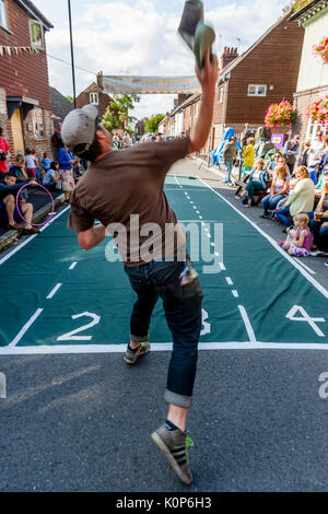 Welly throwing contest Stock Photo - Alamy