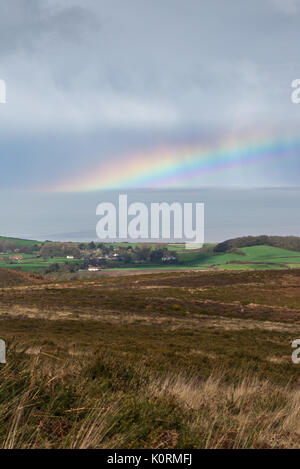 Storm clouds and a rainbow over the Bristol Channel. Picture taken from ...