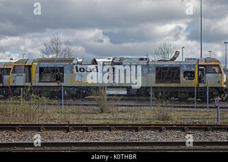 A class 60 diesel locomotive number 60027 workinga train of empty bogie ...