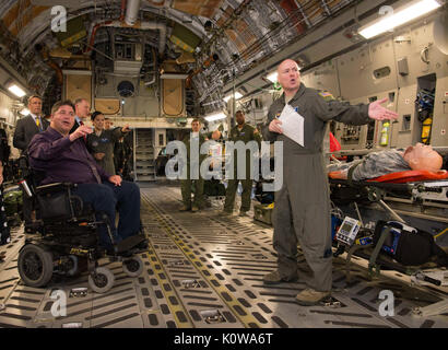 Members of the 86th Aeromedical Evacuation Squadron lift a mannequin ...