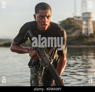 A Dominican Air Force pilot in the cockpit of a Super Tucano fighter ...