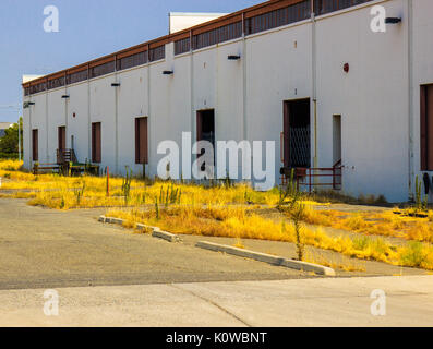 Old and abandoned warehouse loading docks that are falling apart and ...