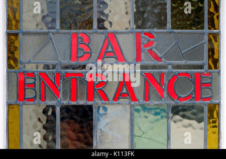 Stained glass Pub door with sign Stock Photo - Alamy