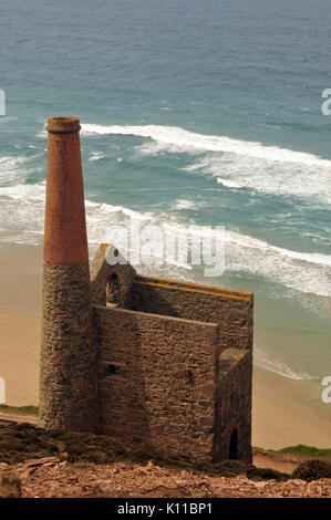 a Cornish tin mine from the 18th century engine houses and chimneys at ...