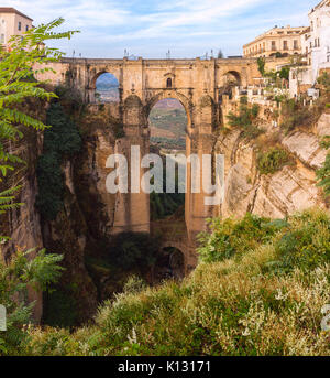 The Puente Nuevo, New bridge in Ronda, Spain spans the 120m deep chasm ...