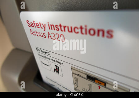 Safety & emergency instruction / guide card during a flight in a ...