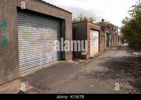 Garage doors in a back alley in central Cardiff, South Wales Stock ...