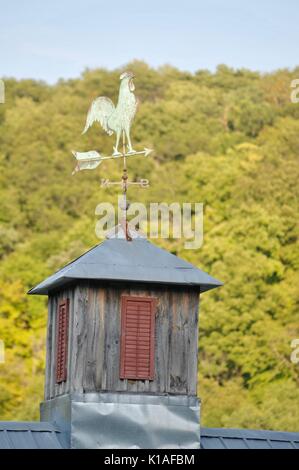 rooster weathervane on top of a barn Stock Photo - Alamy