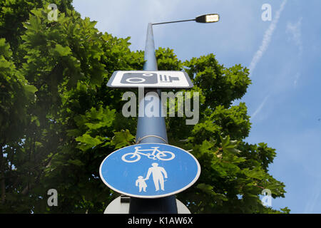 british road sign indicating a shared path for cyclists and pedestrians ...