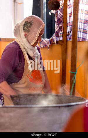 Turkish woman cooking traditional food Stock Photo - Alamy