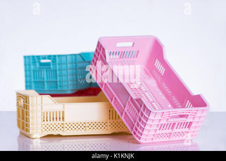 Pastel colored plastic crates Stock Photo - Alamy