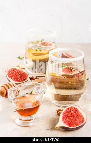 Fall sangria cocktail, fig and honey martini with thyme Stock Photo - Alamy
