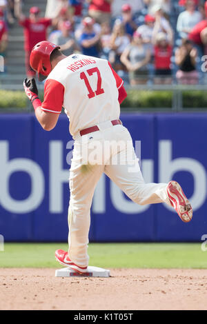 Philadelphia Phillies' Rhys Hoskins runs after hittting a single off ...