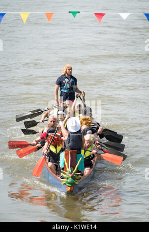 Competitors take part in a Dragon Boat Race to celebrate the Dragon ...