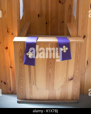 Grid of a confessional in a Christian church, with the symbol of the ...