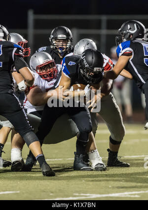 Football action with Trinity vs. University Prep High School in Redding ...