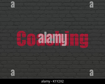 Studying concept: Coaching on wall background Stock Photo - Alamy