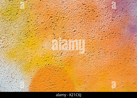 Background of yellow and orange, detail of a wall decorated with colors ...