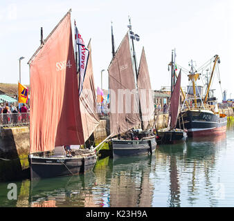 Ancient fishing boat, a Cornish lugger, becalmed off Newlyn Stock Photo ...