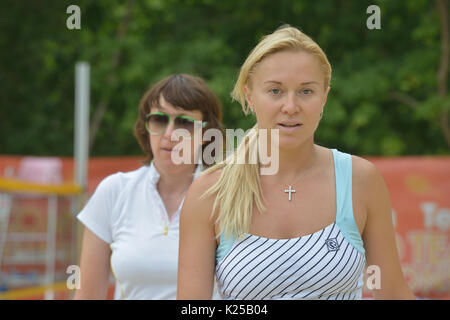 Moscow, Russia - July 17, 2014: Olga Barabanschikova (in front) and ...