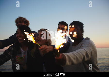 Celebrating Momentous Event with Friends Stock Photo - Alamy