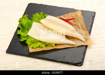Raw squid fillet ready for cooking Stock Photo - Alamy