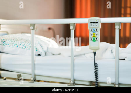 Electric Adjustable Hospital Bed With Remote Control And hand Stock ...