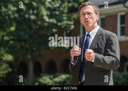 Secretary of the Navy Sean Stackley speaks with Lt. Col. Scott Trent ...