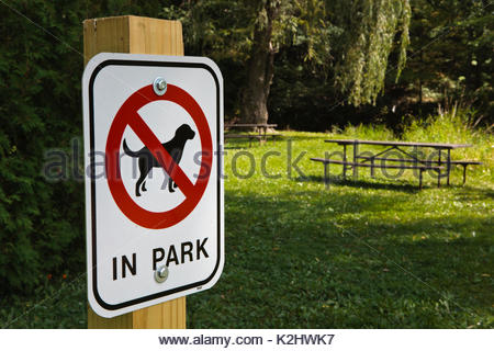 park No pets allowed sign woman walking dog ohio Stock Photo: 30369180 ...
