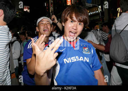 Soccer fans celebrate on Shibuya scramble crossing in Tokyo Sunday ...