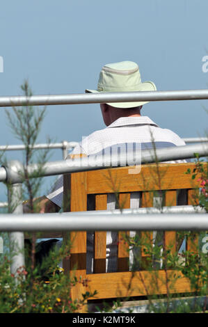 Taking some time to reflect on my life. a handsome young man looking at ...