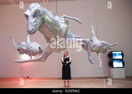 Bright neon sculptures including Violins Violence Silence and Run from ...