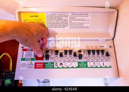 A newly fitted electricity consumer unit, with multiple on/off switches ...