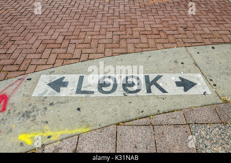 Look both ways before crossing sign next to pedestrian crossing, Falls ...