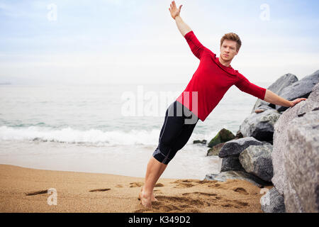 The young man doing physical exercises at home Stock Photo - Alamy