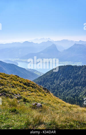 A vertical shot o a beautiful landscape of mountains under a cloudy sky ...