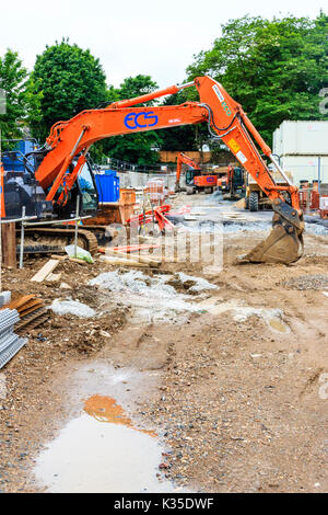 Orange earthmover, redevelopment of old Ashmount School site, Islington ...